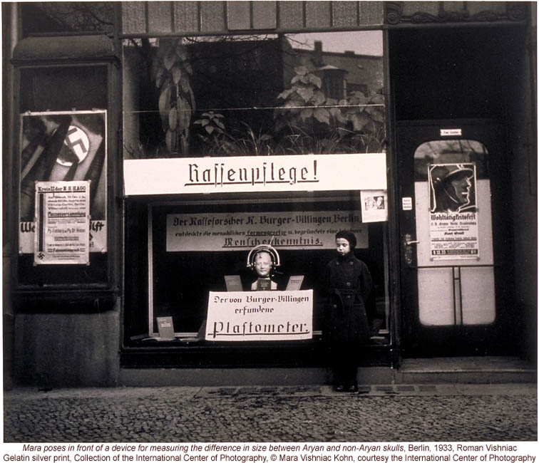 Nazi propaganda in Berlin storefront, including anthropometric device ...